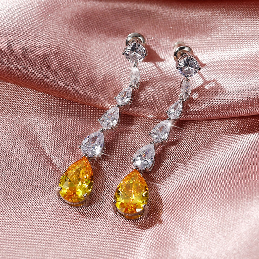 Yellow dangling earrings store